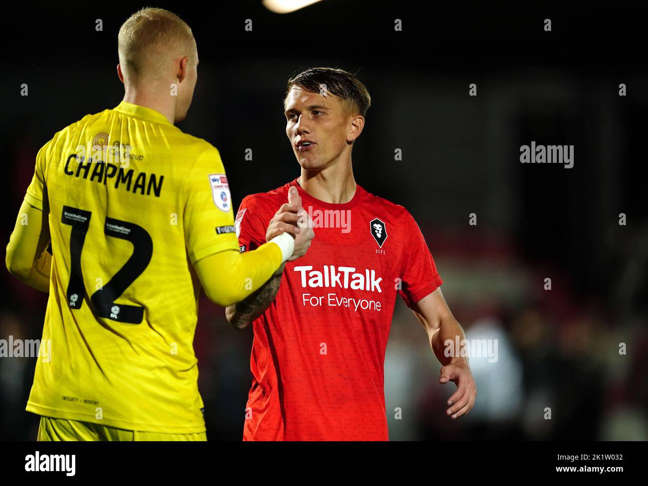 Salford City's Ethan Galbraith (right) celebrates coring the winning ...