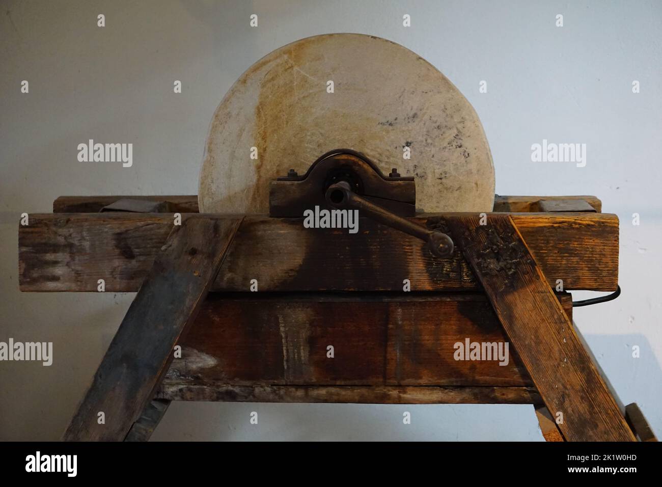An old rustic stonecutter isolated on a white background Stock Photo ...