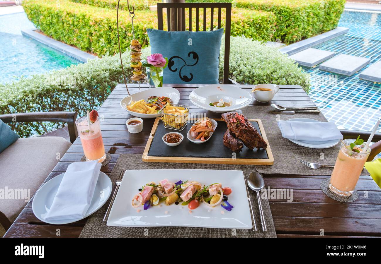 Grilled pork ribs, roasted meat with rosemary, top view of grille pork ...