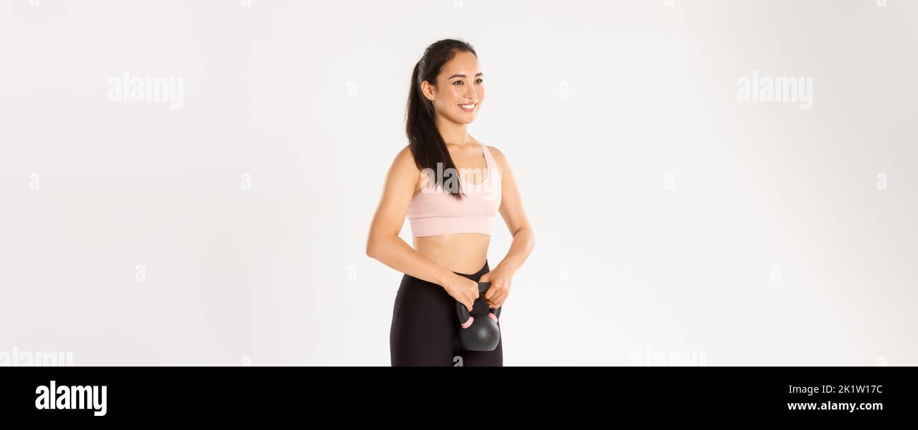 Sport, wellbeing and active lifestyle concept. Smiling strong and slim ...