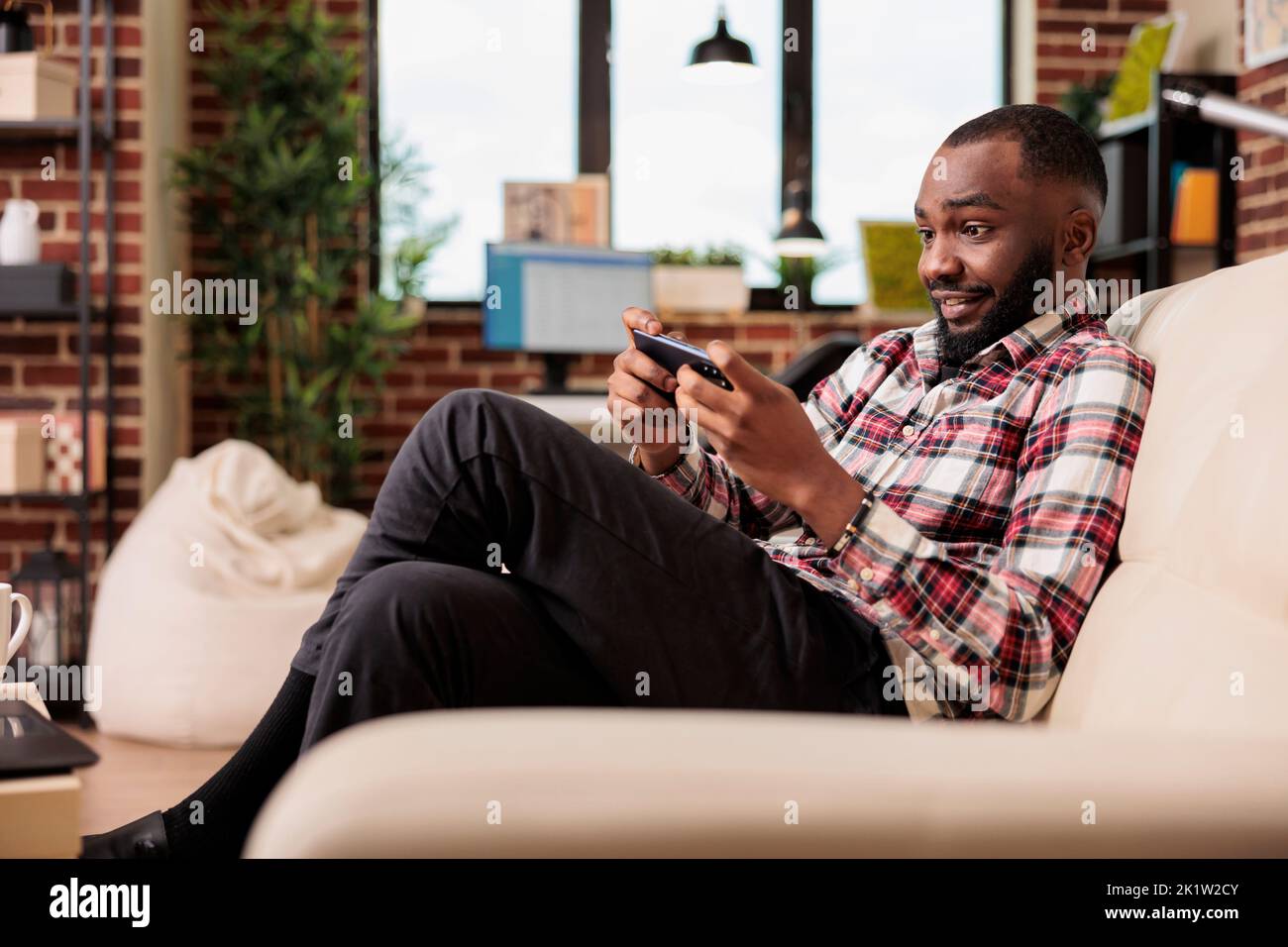 Happy virtual gamer having fun with video games, playing online ...