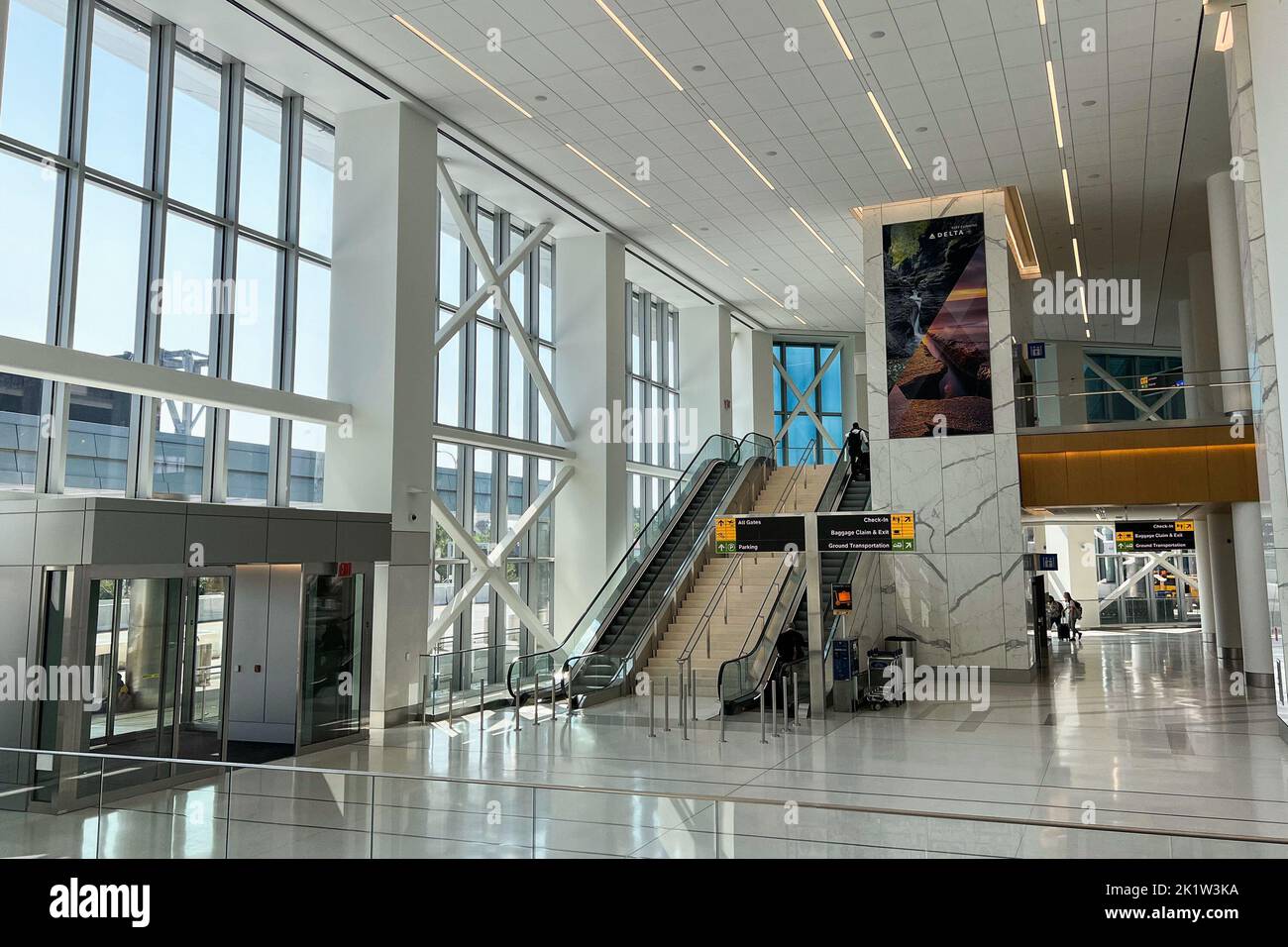 Passengers are seen at the new Delta Air Lines terminal at LaGuardia ...