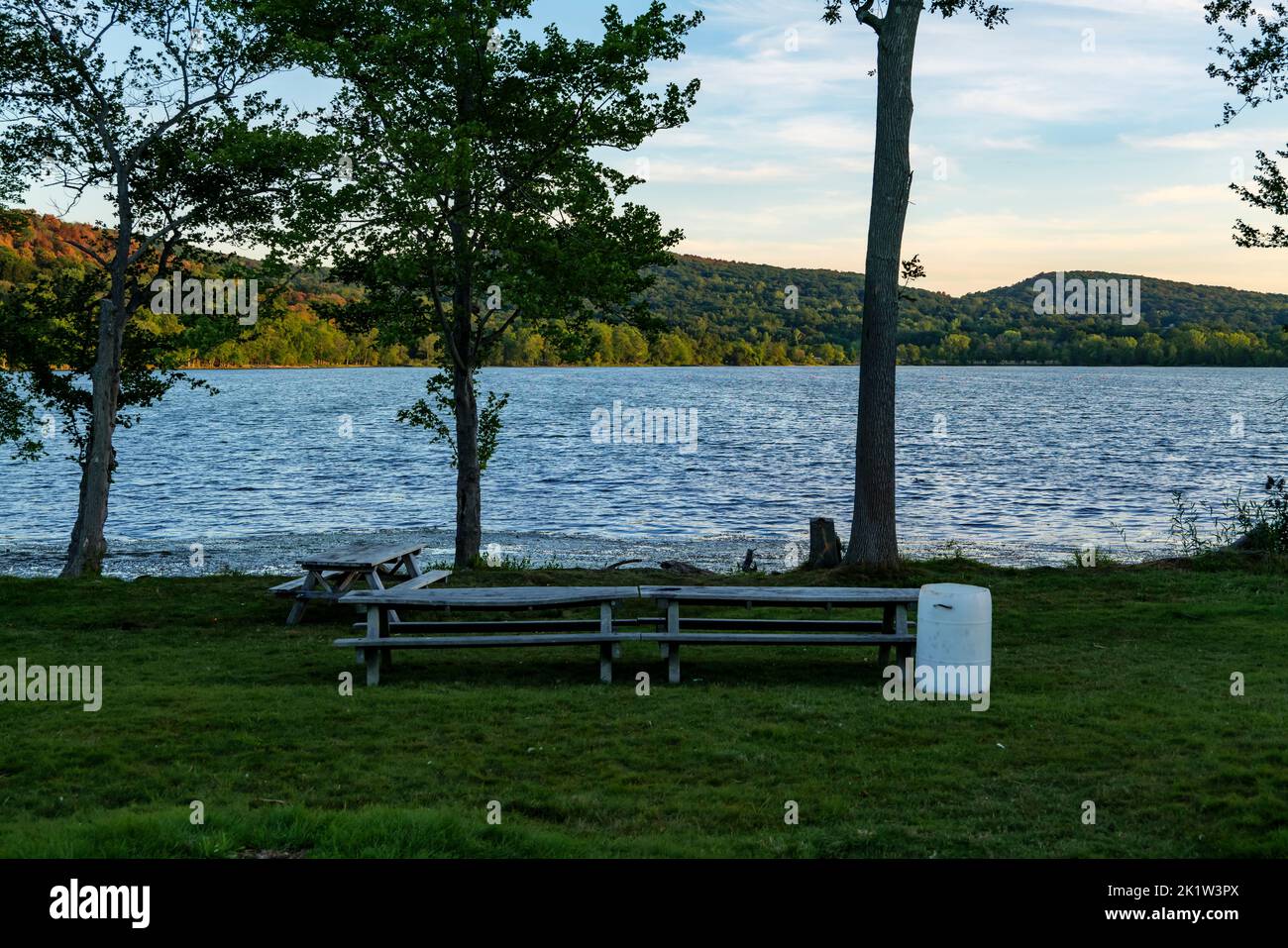 White plastic barrel for garbage in a park near Rockland Lake, New York ...