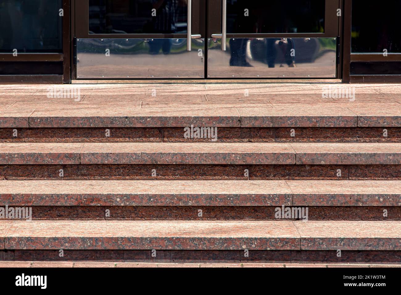 granite staircase with stone steps rise to the entrance front door with ...