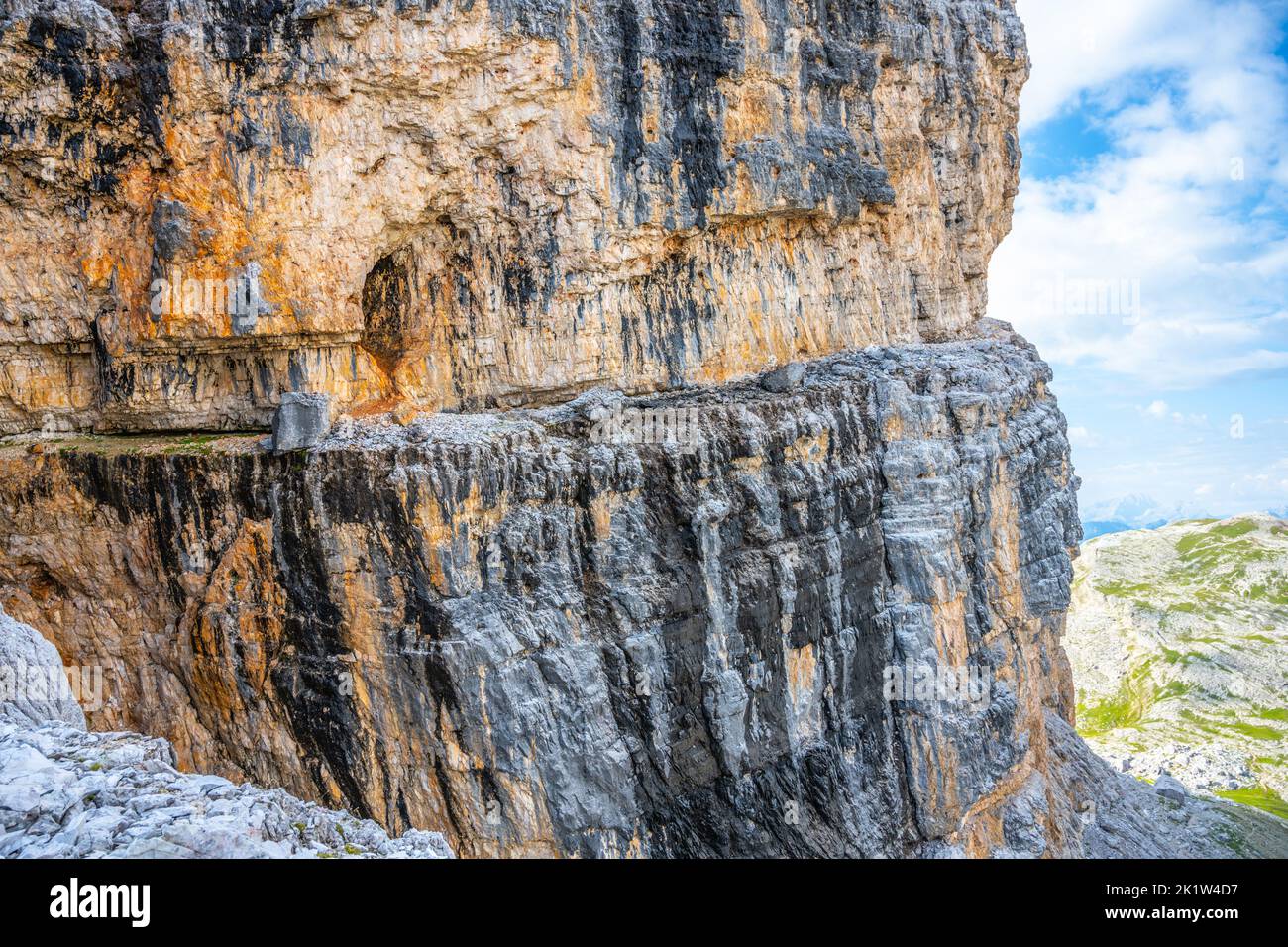 Tourist path in vertical wall of high mountain Stock Photo - Alamy
