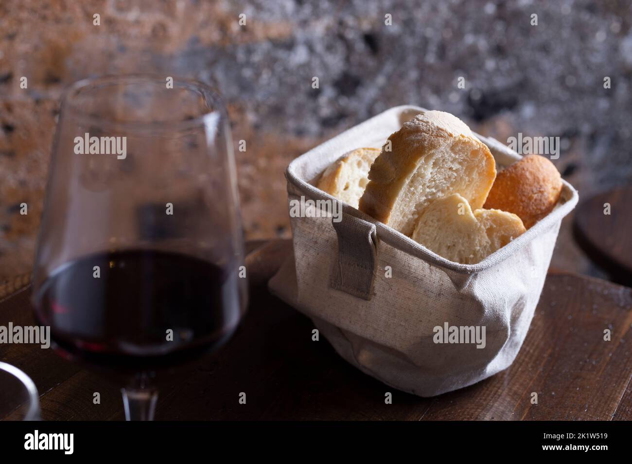 Basket of bread on a restaurant table (detail Stock Photo - Alamy