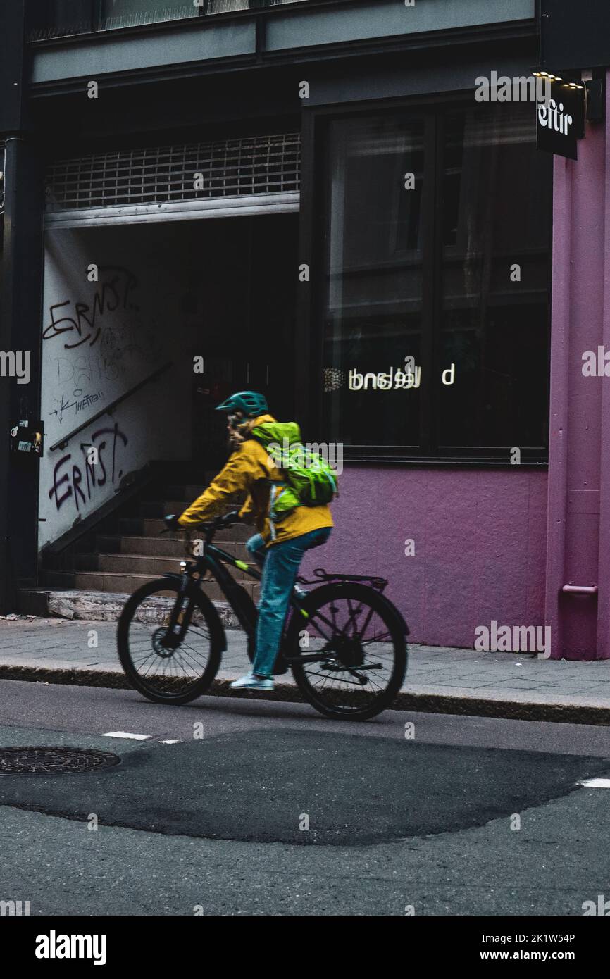 Woman in yellow jacket hi-res stock photography and images - Alamy