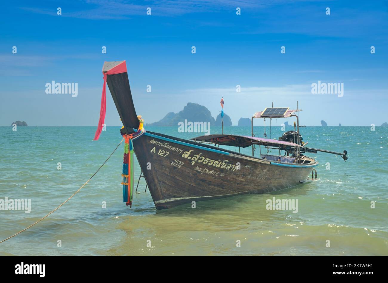 Long tail boat on the shore Andaman Sea Stock Photo - Alamy