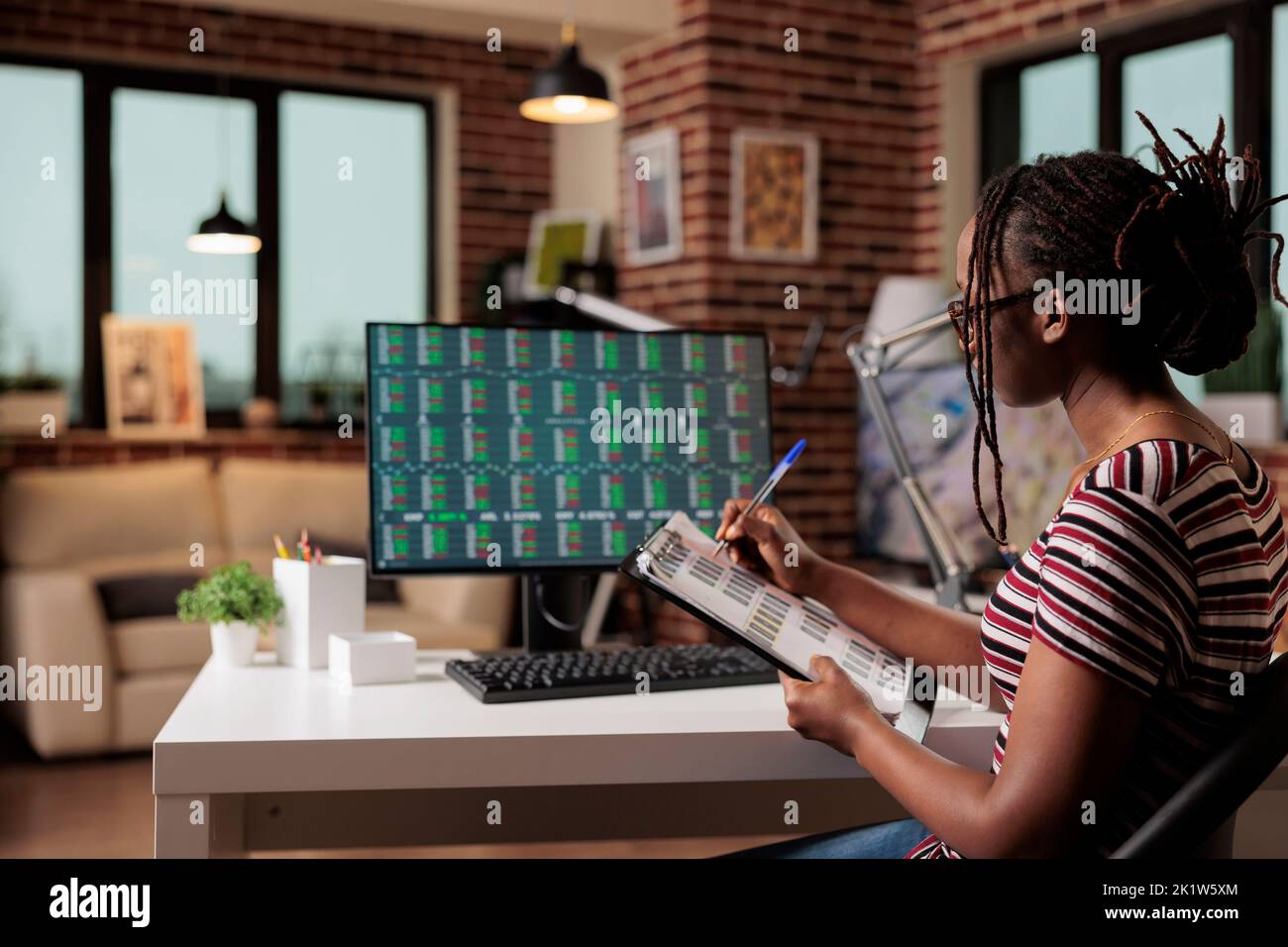 Financial analyst investor monitoring hi-res stock photography and ...