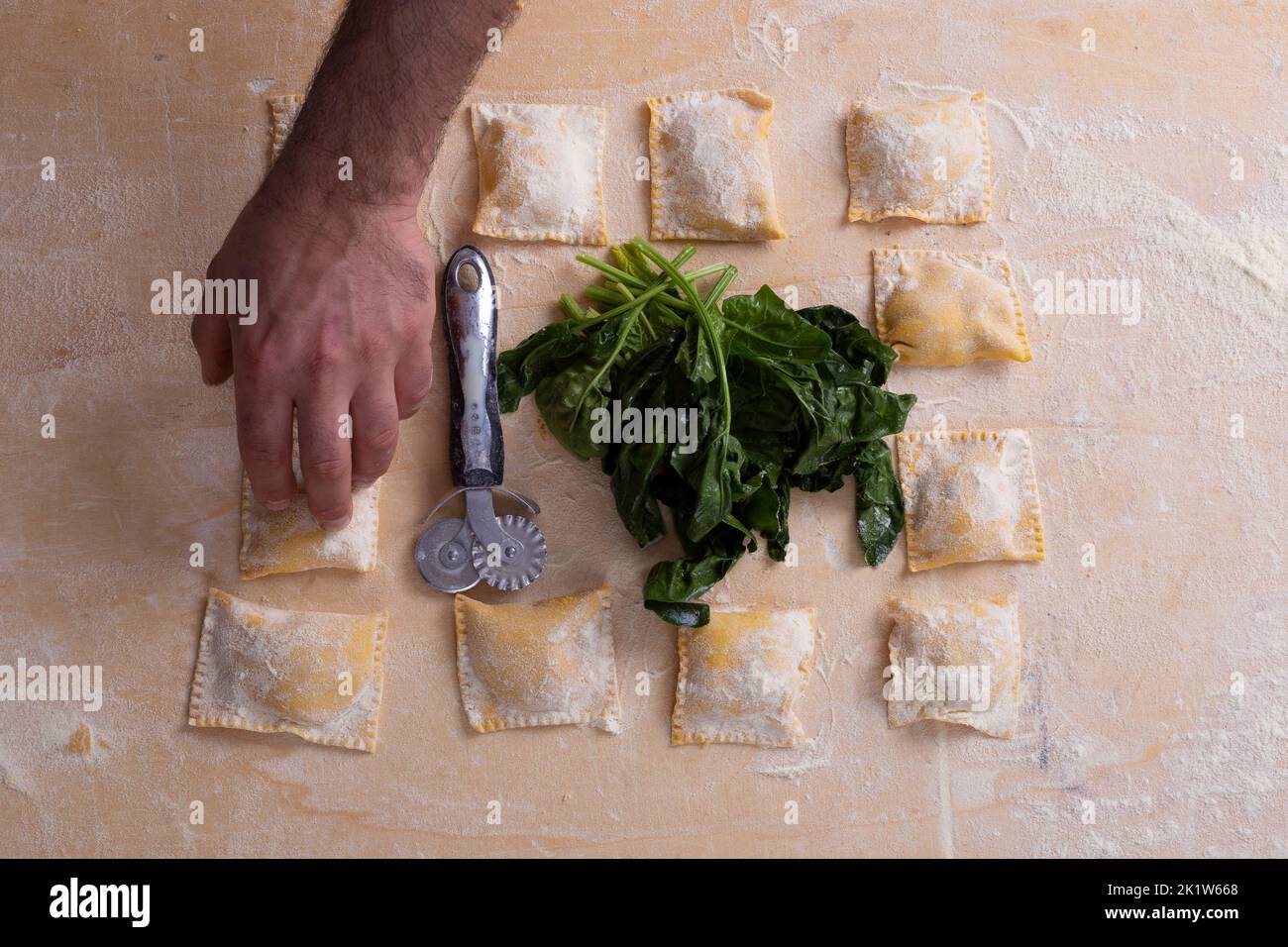 Fresh made italian spinach ravioli Stock Photo - Alamy