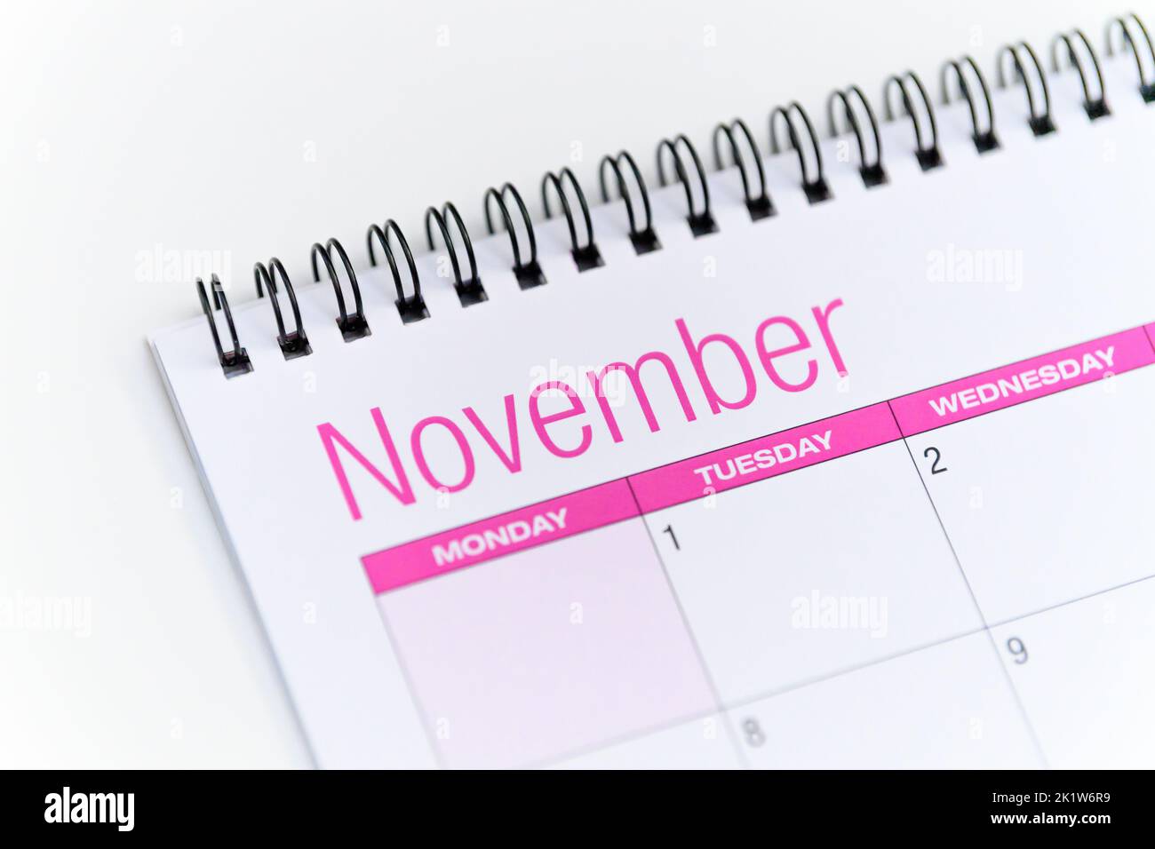 A closeup of a calendar opened on the November month page and placed on ...