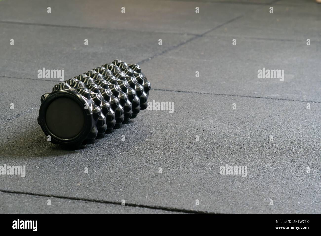 Black foam athletic roller massage exercise sport body training ...