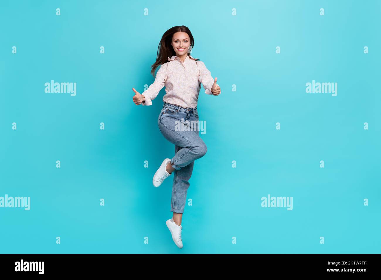 Photo of satisfied girl two arm demonstrate like cool symbol rejoice ...