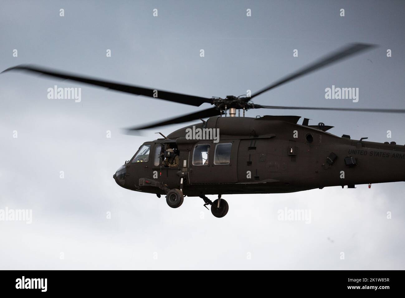 A U.S. Army UH-60 Blackhawk helicopter prepares to land for cold load ...