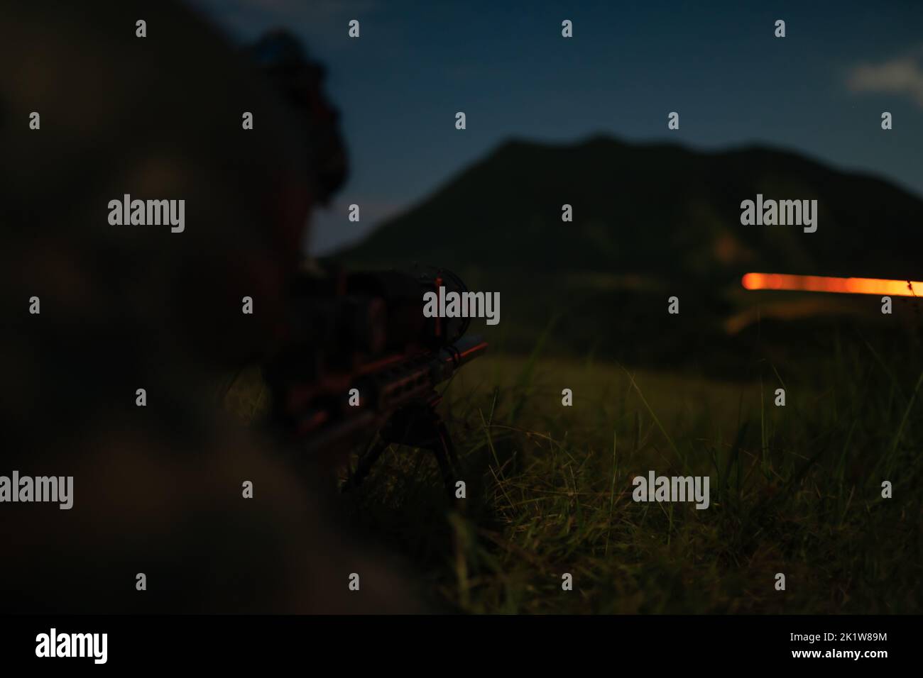 A U.S. Marine Corps sniper with 3d Battalion, 3d Marines conduct fire ...