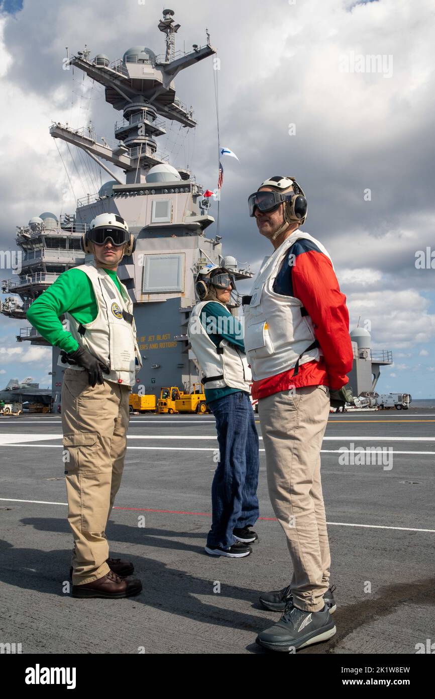 Capt. Jeremy Shamblee, left, the first-in class aircraft carrier USS ...