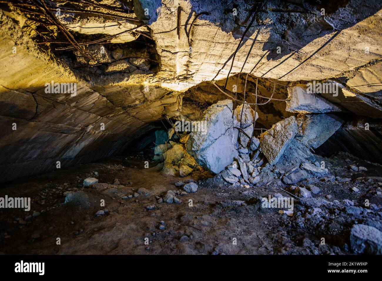 Dark dirty collapsed mine tunnel in Karmadon gorge Stock Photo - Alamy