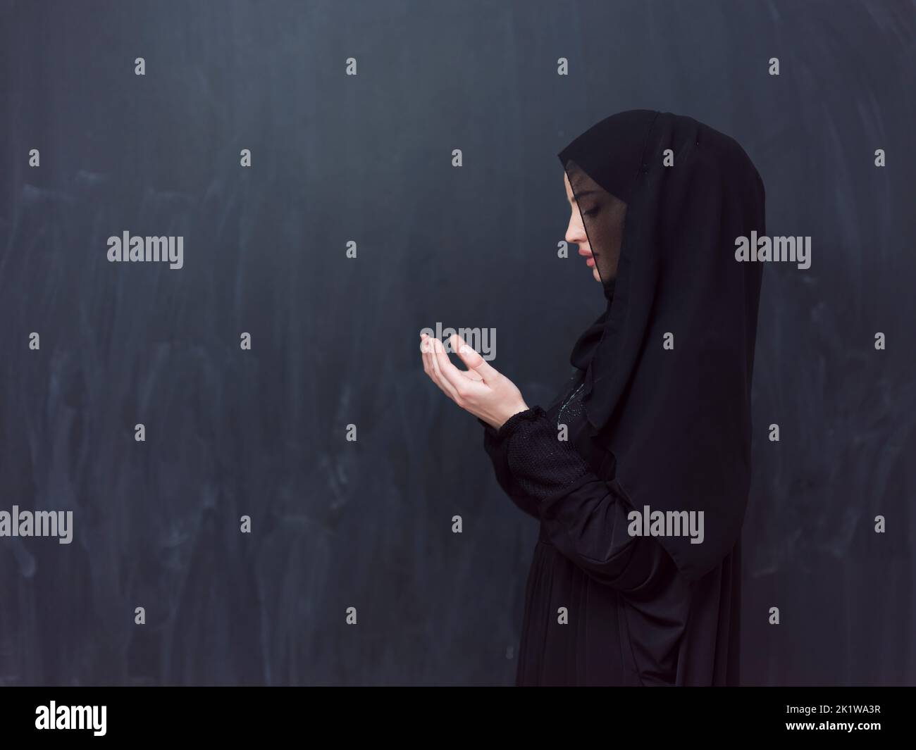 Portrait of young Muslim woman making dua Stock Photo - Alamy