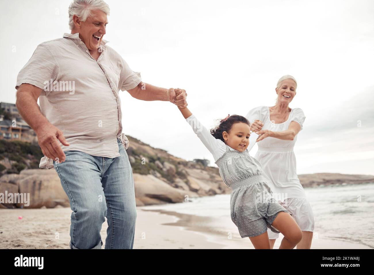 Child helping elderly walk hi-res stock photography and images - Alamy