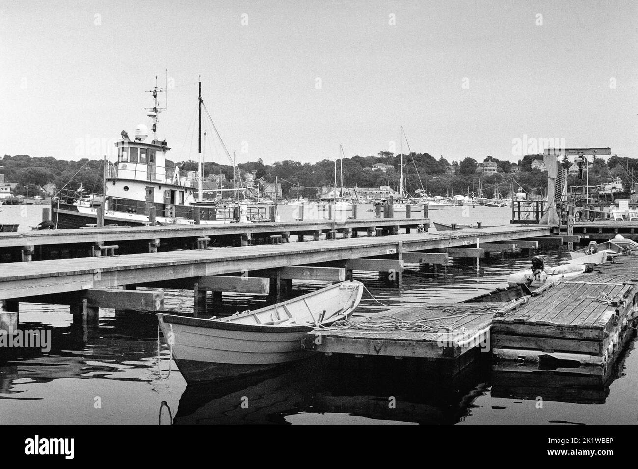 Vintage wooden boats docked in Gloucester Harbor, Massachusetts. The ...