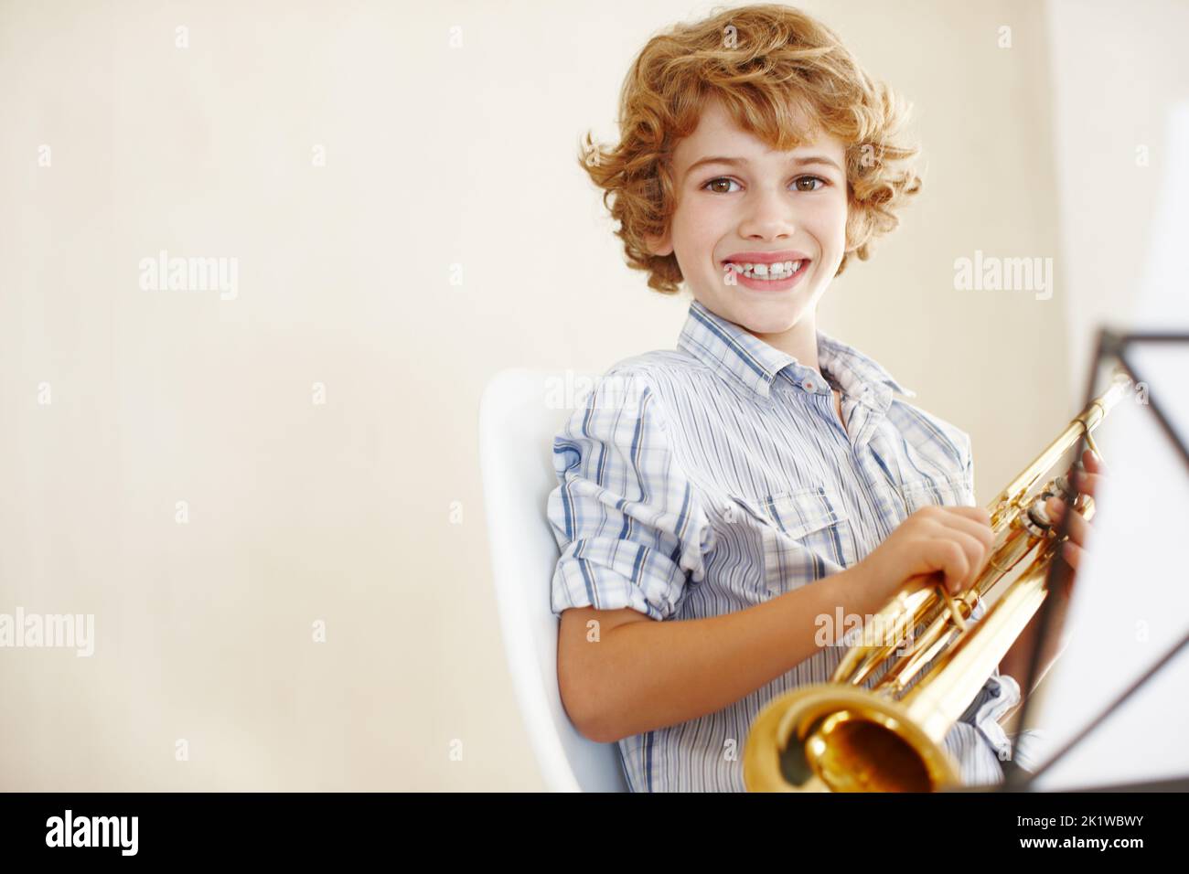 Playing trumpet home hi-res stock photography and images - Alamy