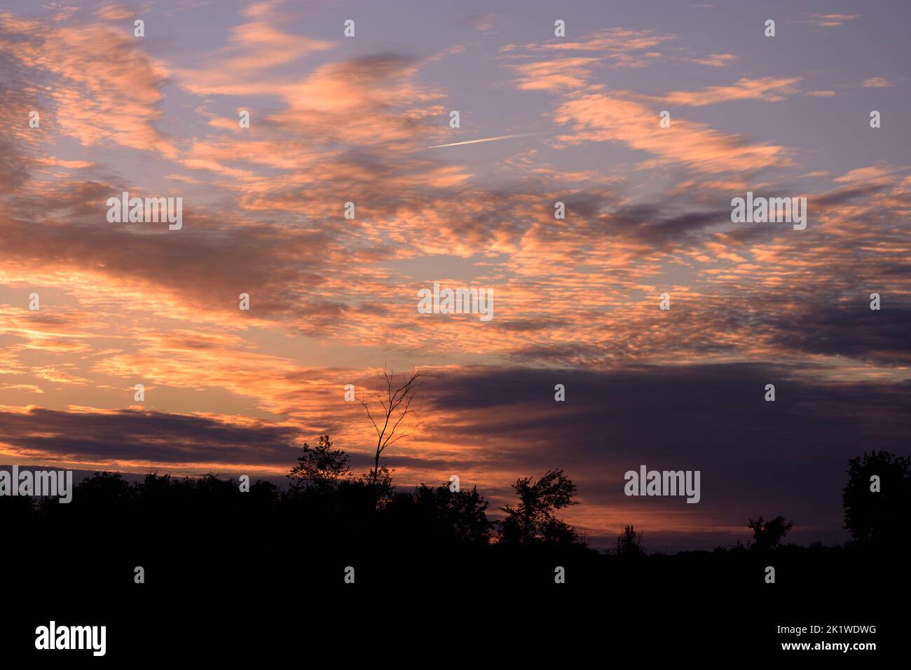 Cutting through the sky, and bringing hope Stock Photo - Alamy