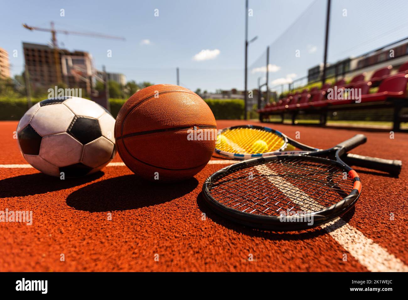Set of sport equipment, rackets and tennis balls soccer and basketball ...
