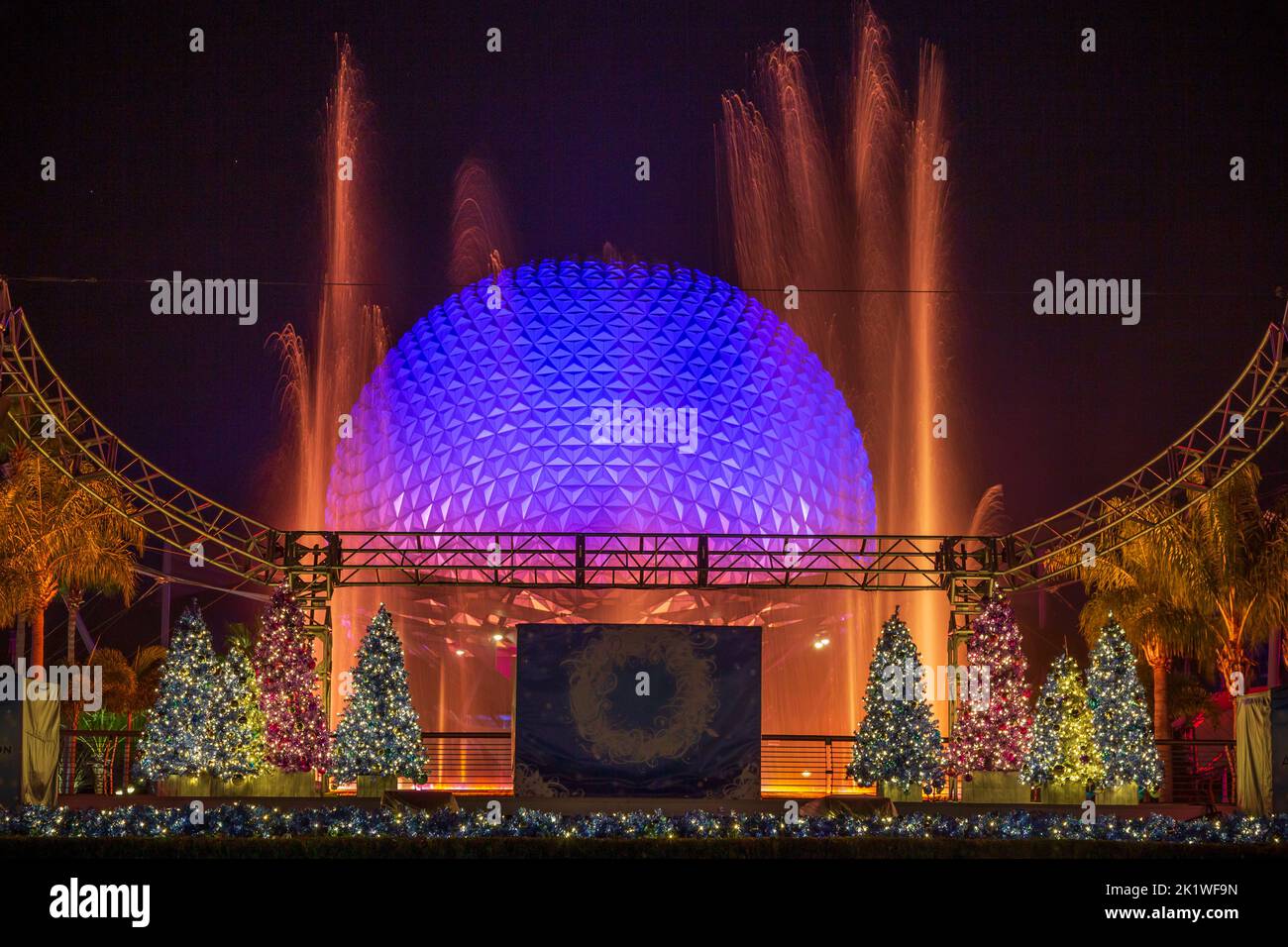 The Spaceship Earth dome illuminated at night at Epcot Center, Orlando ...