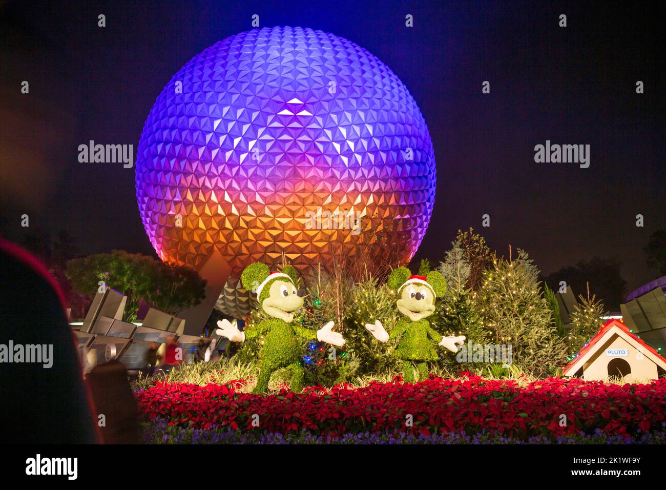 The Spaceship Earth dome illuminated at night at Epcot Center, Orlando ...