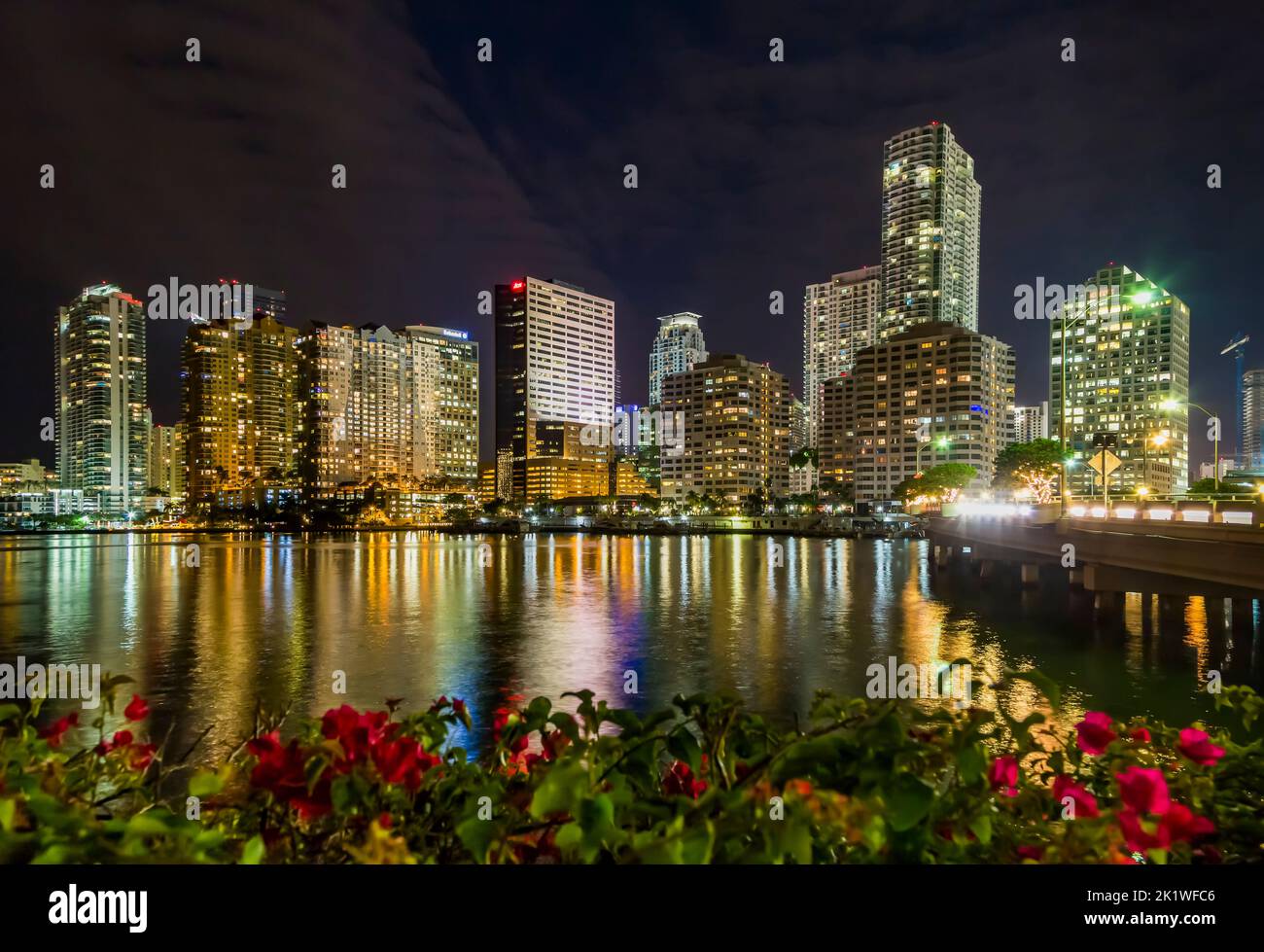 Buildings of the city skyline reflected in the intracoastal waterway at ...