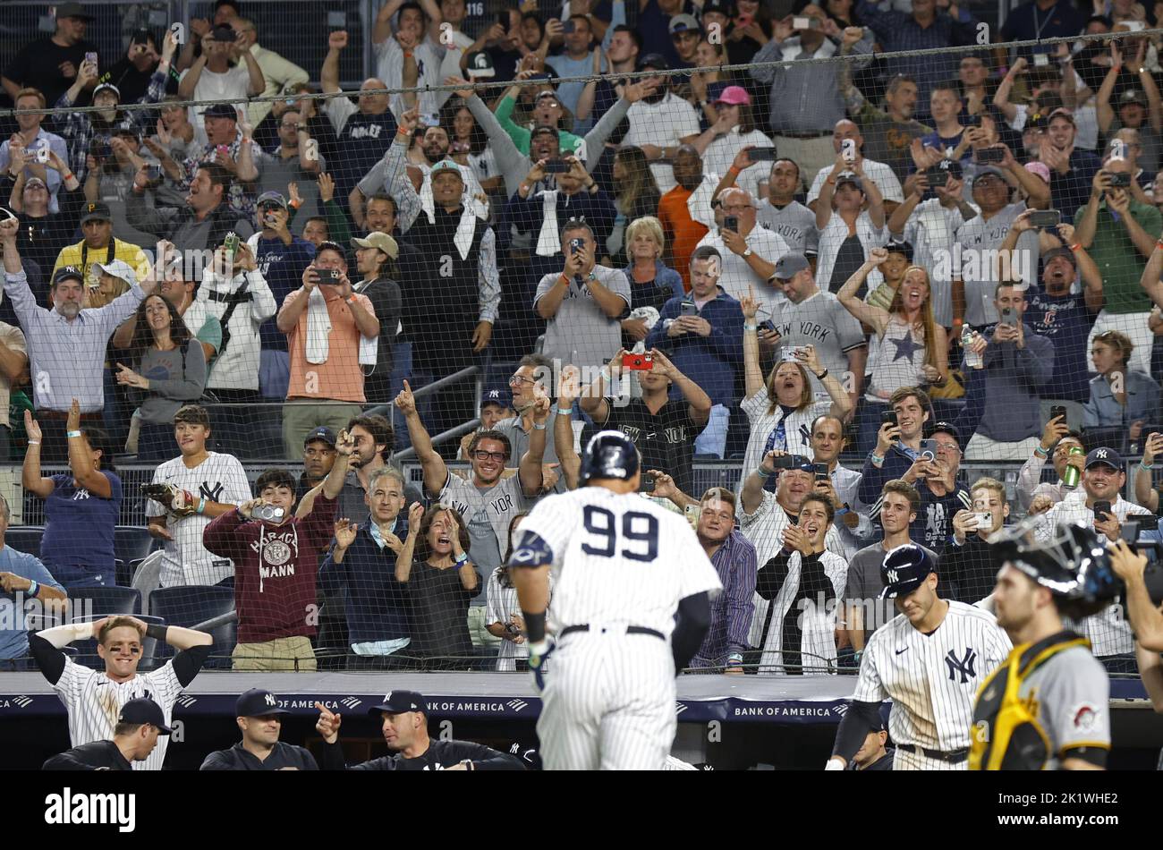 The crowd cheers after New York Yankees Aaron Judge hit his 60th home run of the season against ...