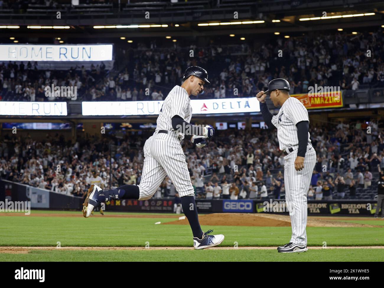 New York Yankees Aaron Judge runs the bases after hitting his 60th home run of the season ...