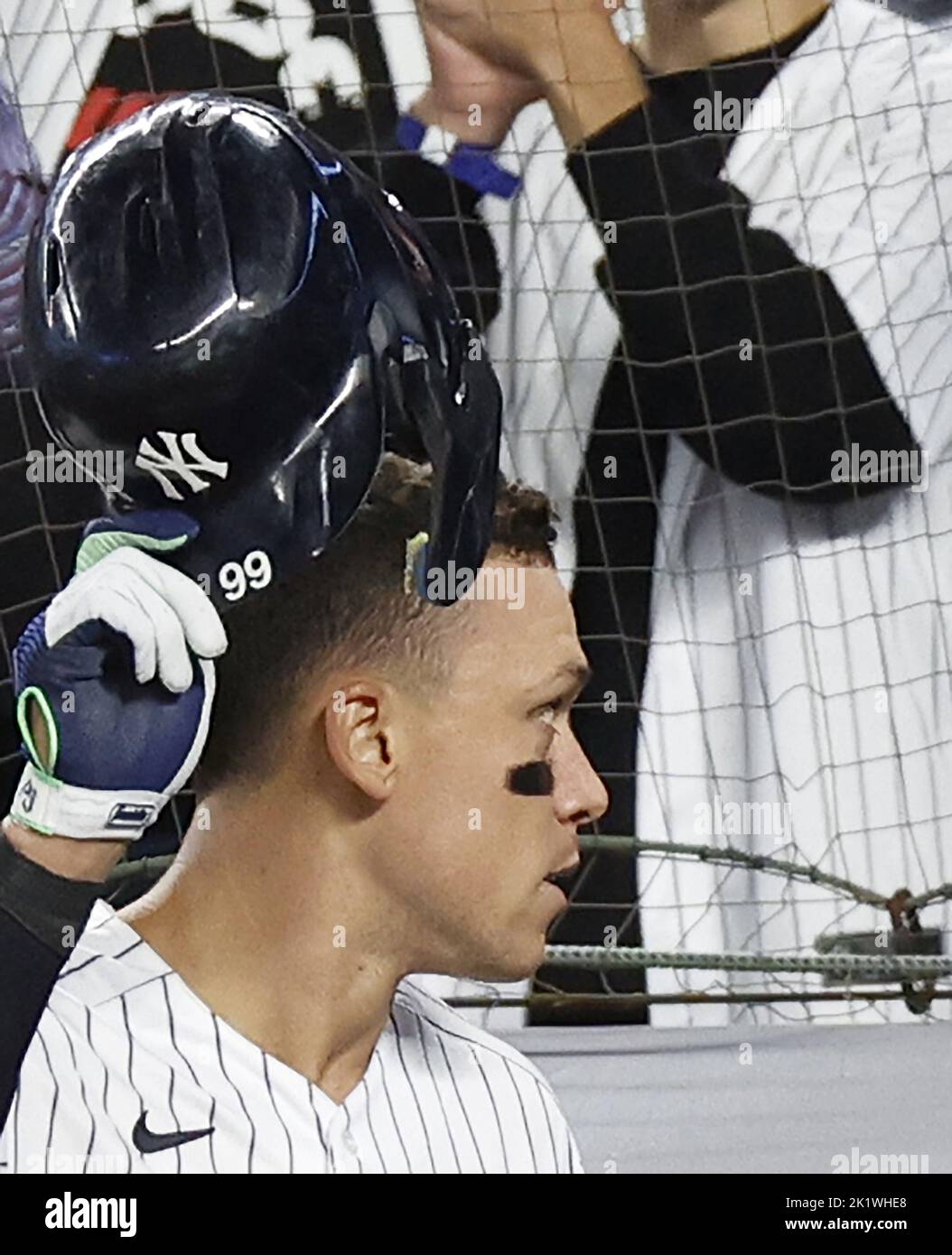New York Yankees Aaron Judge tips his helmet after he hit his 60th home run of the season ...
