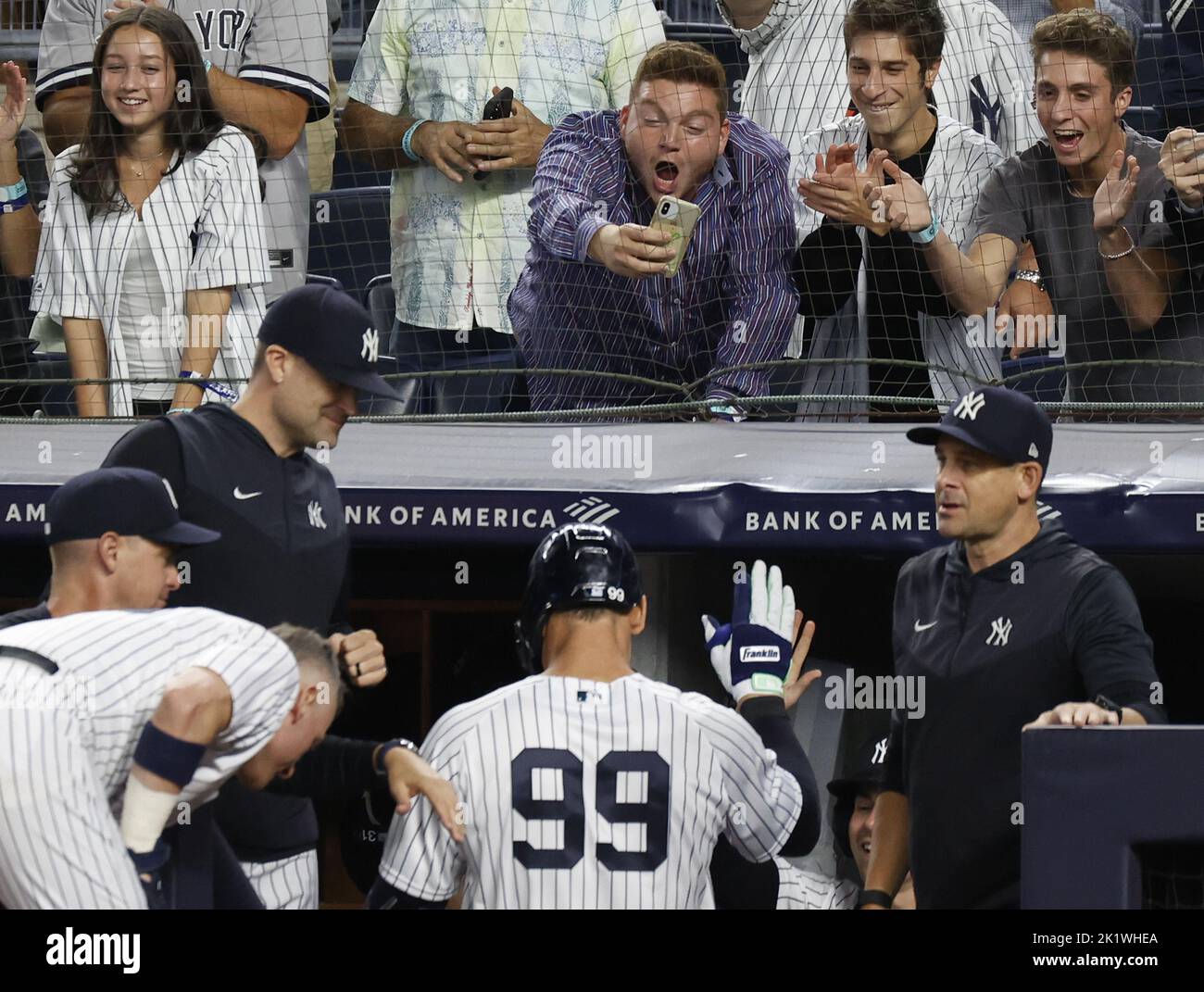 The crowd cheers after New York Yankees Aaron Judge hit his 60th home run of the season against ...