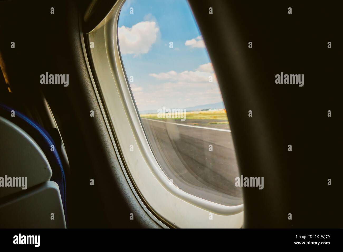 A Airplane window view with landscape outside and copyspace Stock Photo ...