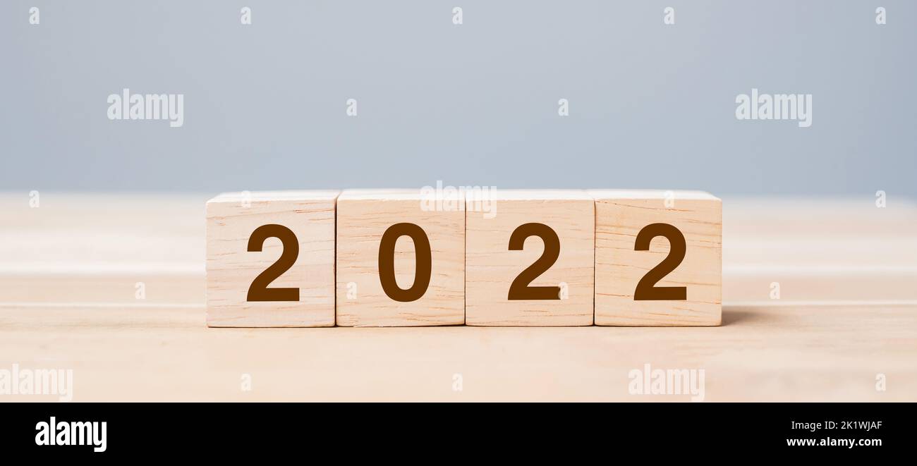 2022 wooden cube blocks on table background. Resolution, plan, review ...