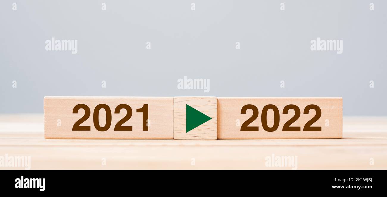 2021 and 2022 wooden block on table background. Resolution, strategy ...