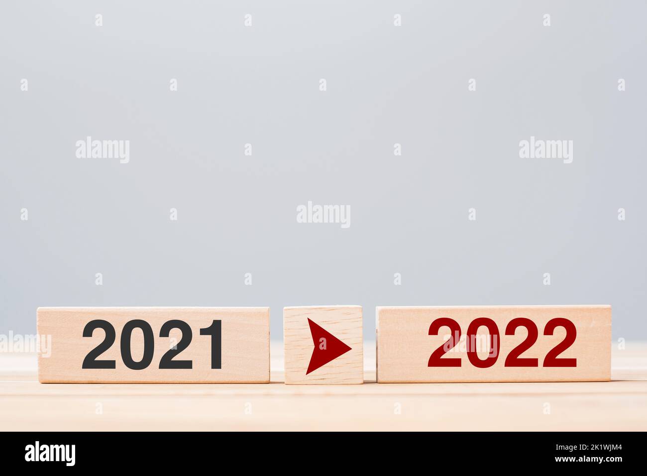 2021 and 2022 wooden block on table background. Resolution, strategy ...