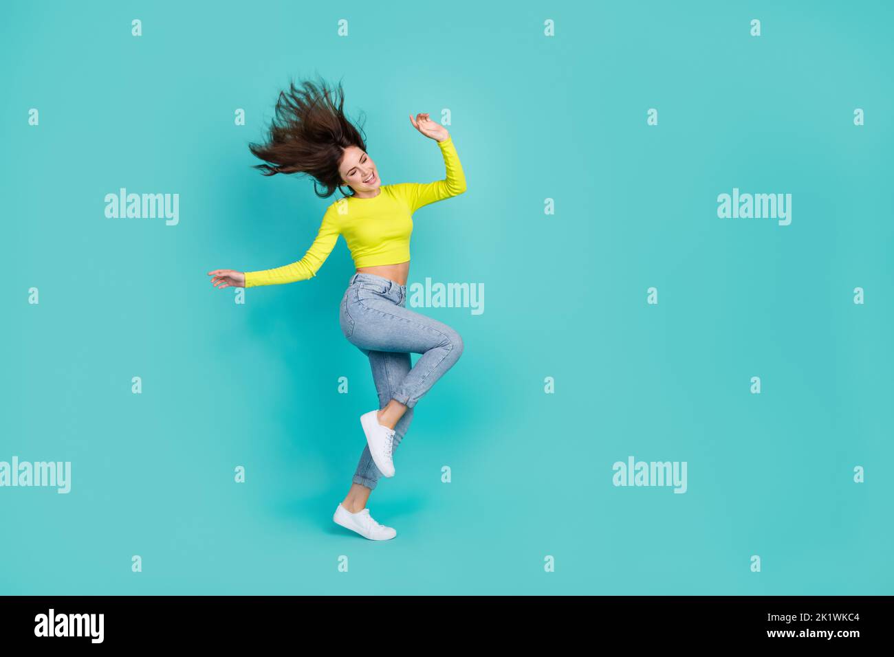 Full size portrait of pretty positive girl dancing stand one leg flying ...