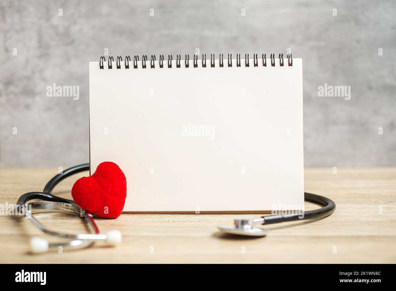blank notebook and stethoscope for copy space your text. healthcare ...