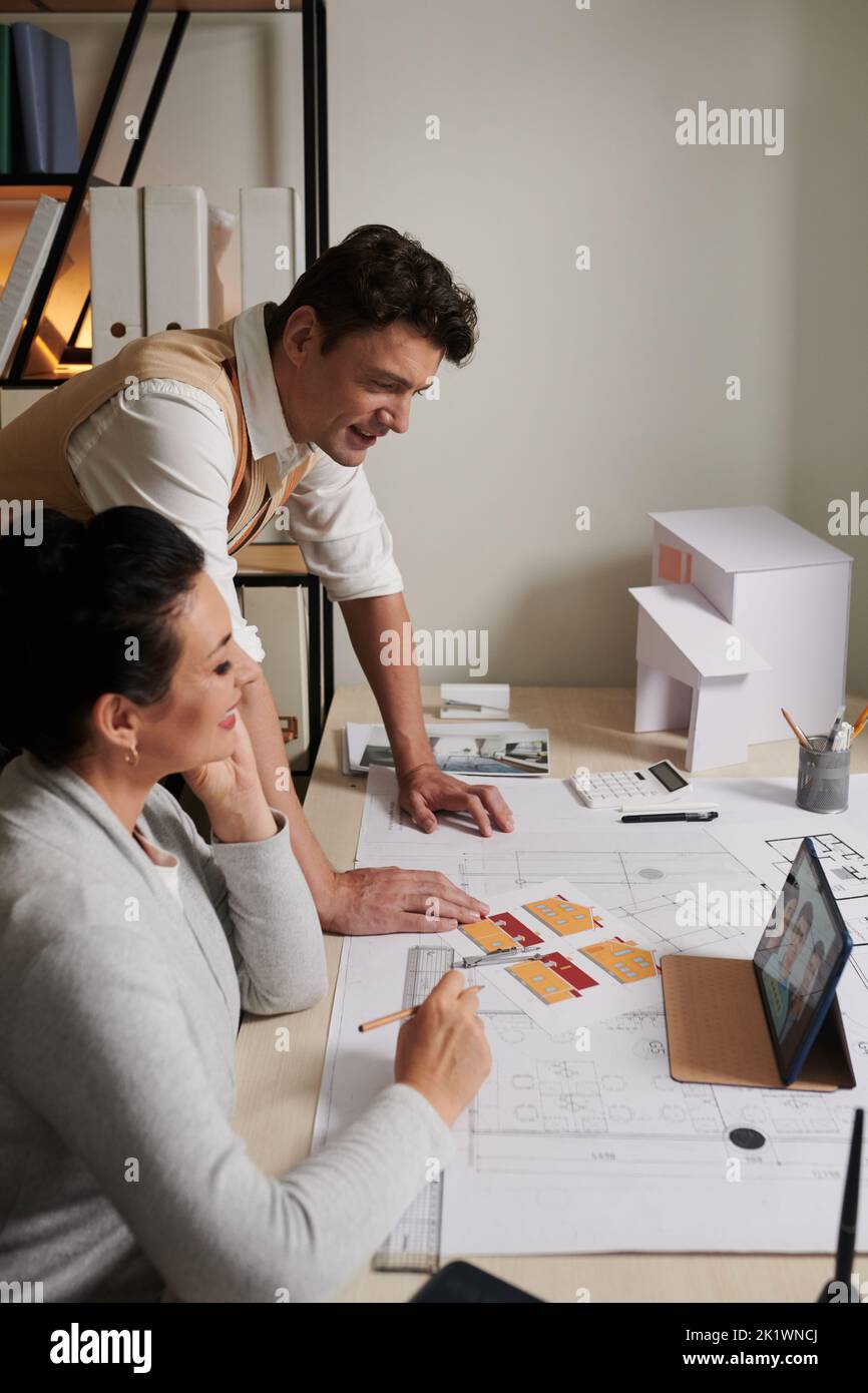 Architects having online meeting with investors and discussing ...