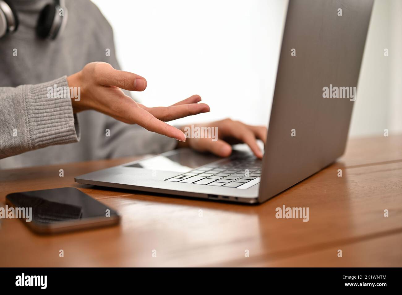 An Asian male college student or freelance having a problem on his ...