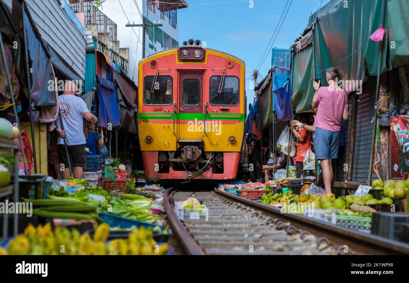 Maeklong Railway Market Thailand, . Train on Tracks Moving Slow ...