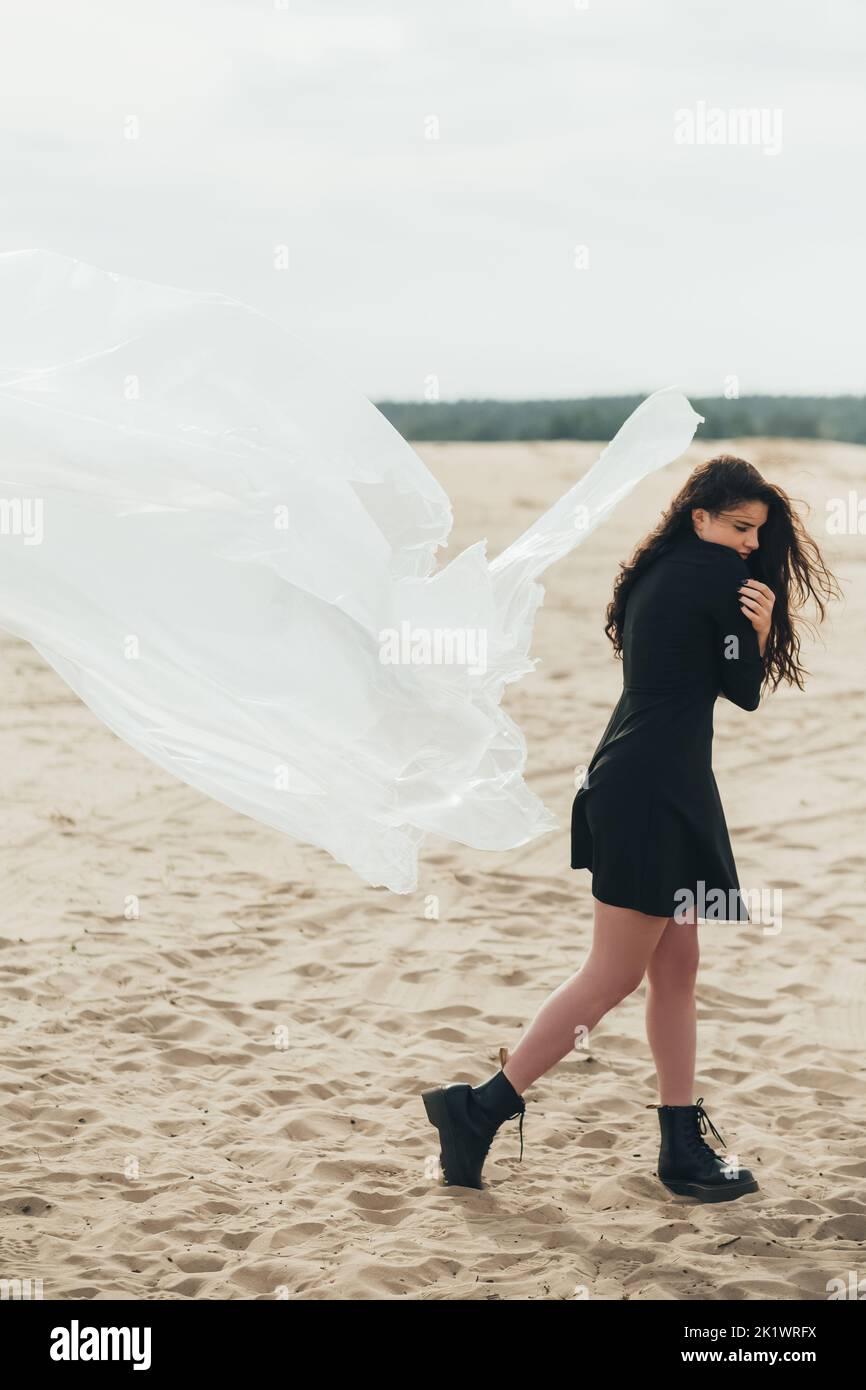 Girl Walking In The Wind
