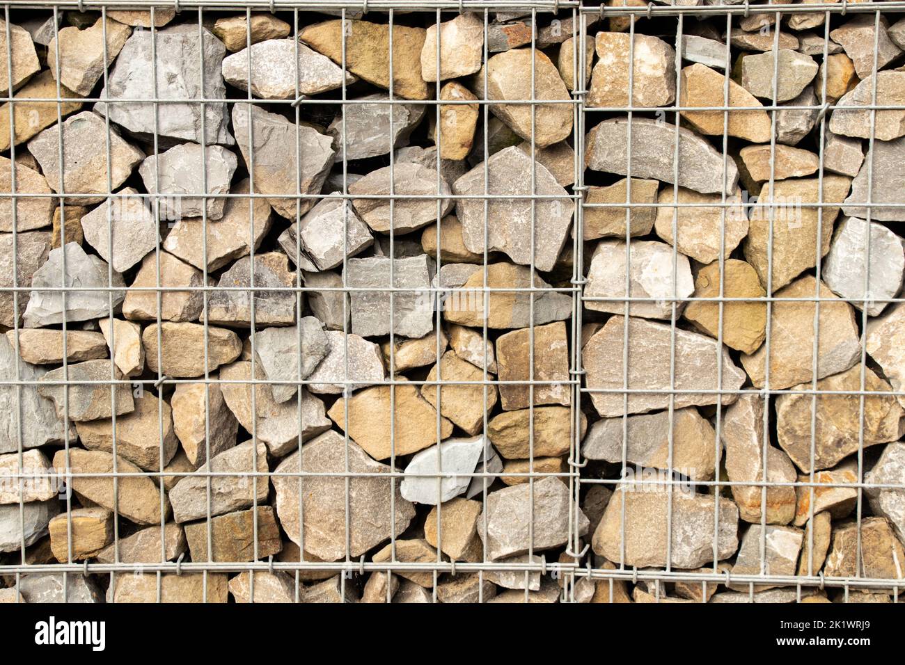 Gabion fence made of mountain stones in the Carpathian mountains in ...