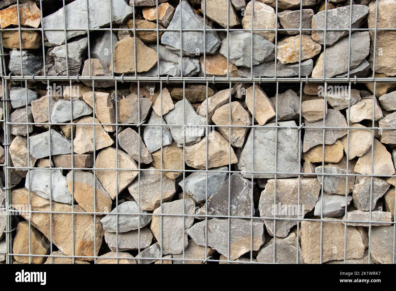 Gabion fence made of mountain stones in the Carpathian mountains in ...