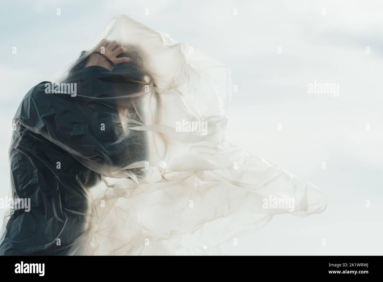 Female abuse. Defocused silhouette. Self isolation anxiety. Profile of ...