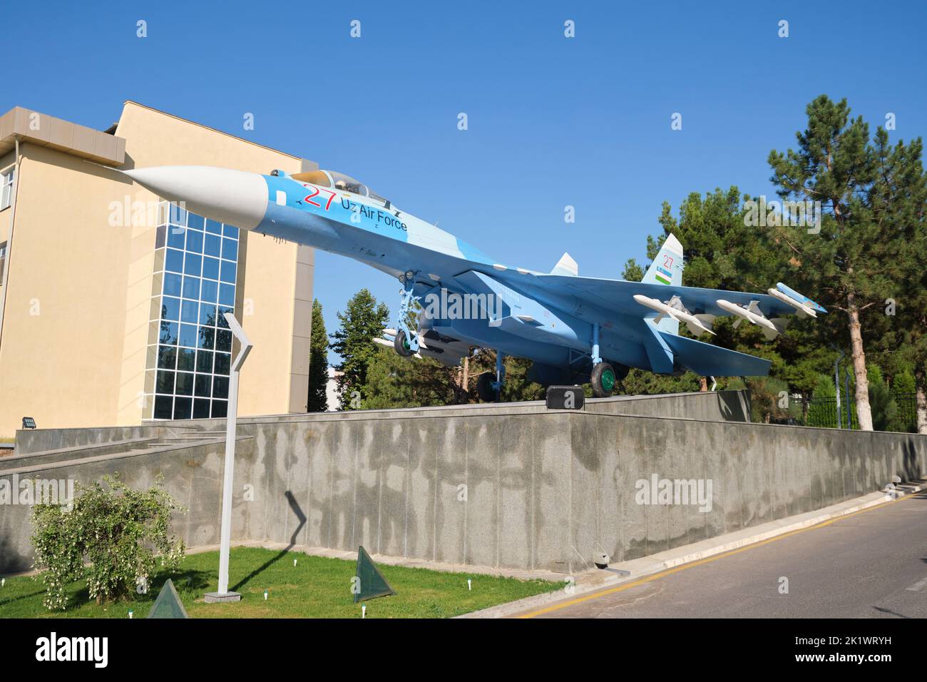 A restored blue and white Uzbek Air Force Sukhoi Su-27 fighter jet ...