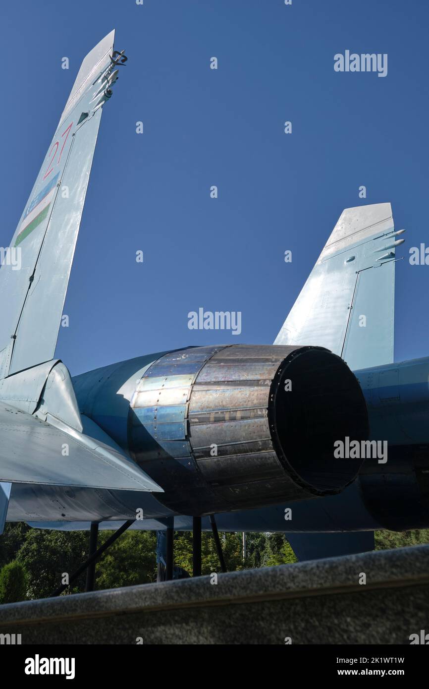 Tail detail of a restored blue and white Uzbek Air Force Sukhoi Su-27 ...