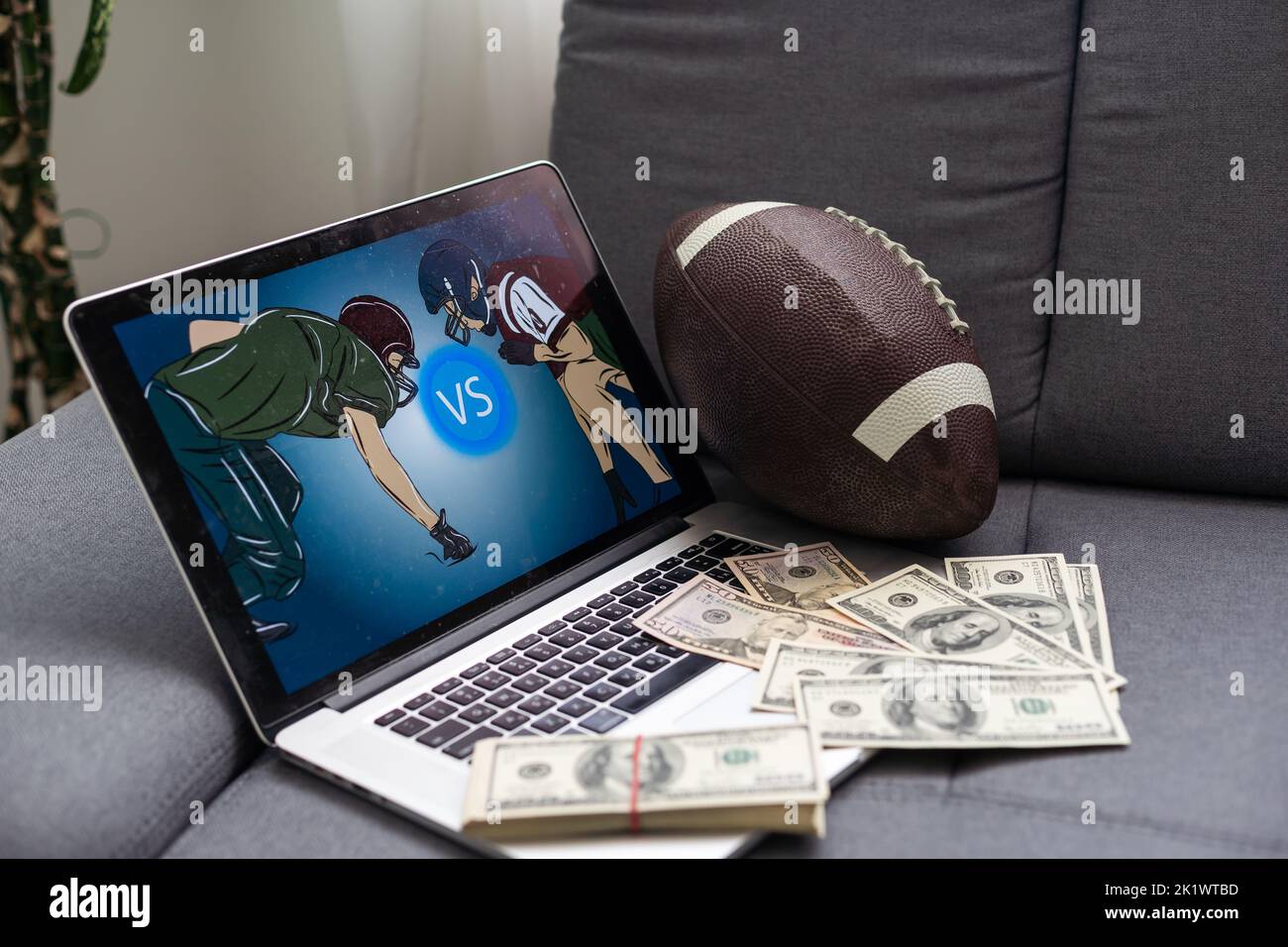 Football ball and money. video game at home Stock Photo - Alamy